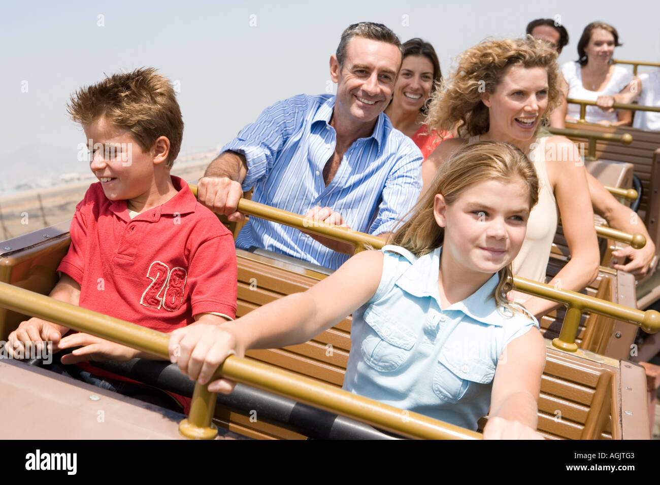 Family on a rollercoaster Stock Photo - Alamy