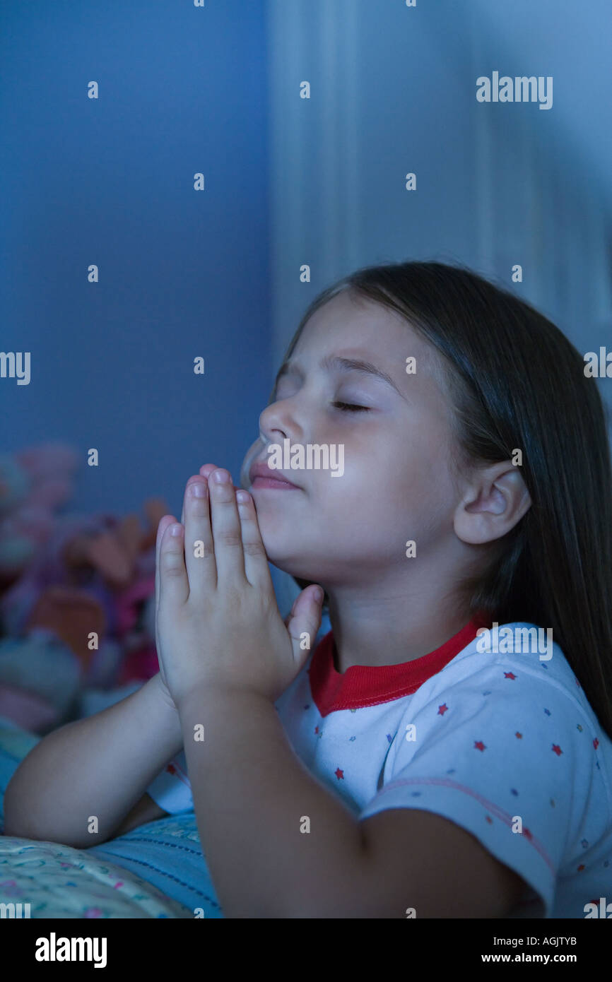 Child praying bedtime hi-res stock photography and images - Alamy