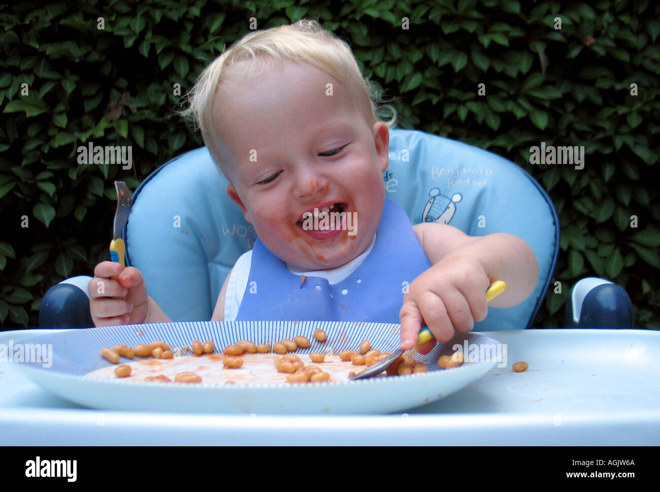 Boy eating beans hi-res stock photography and images - Alamy