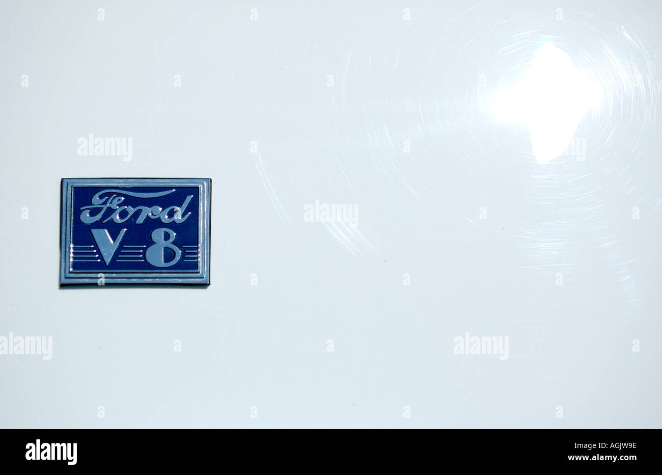 Ford V8 logo on car Stock Photo - Alamy
