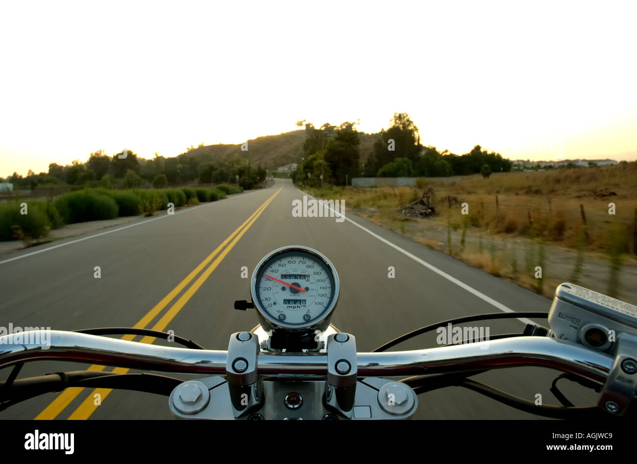 Motorcycle moving on a straight road from rider s perspective Stock ...