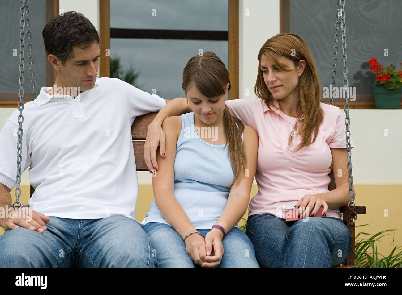 Parents comforting daughter Stock Photo, Royalty Free Image: 8129749 ...