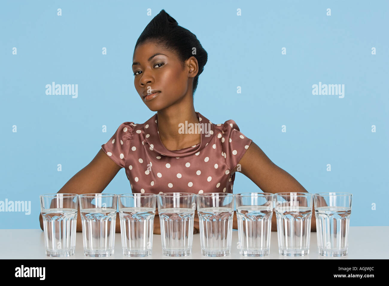 Eight glasses of water hi-res stock photography and images - Alamy