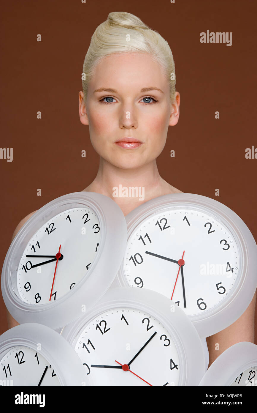 Young woman wearing clocks Stock Photo - Alamy