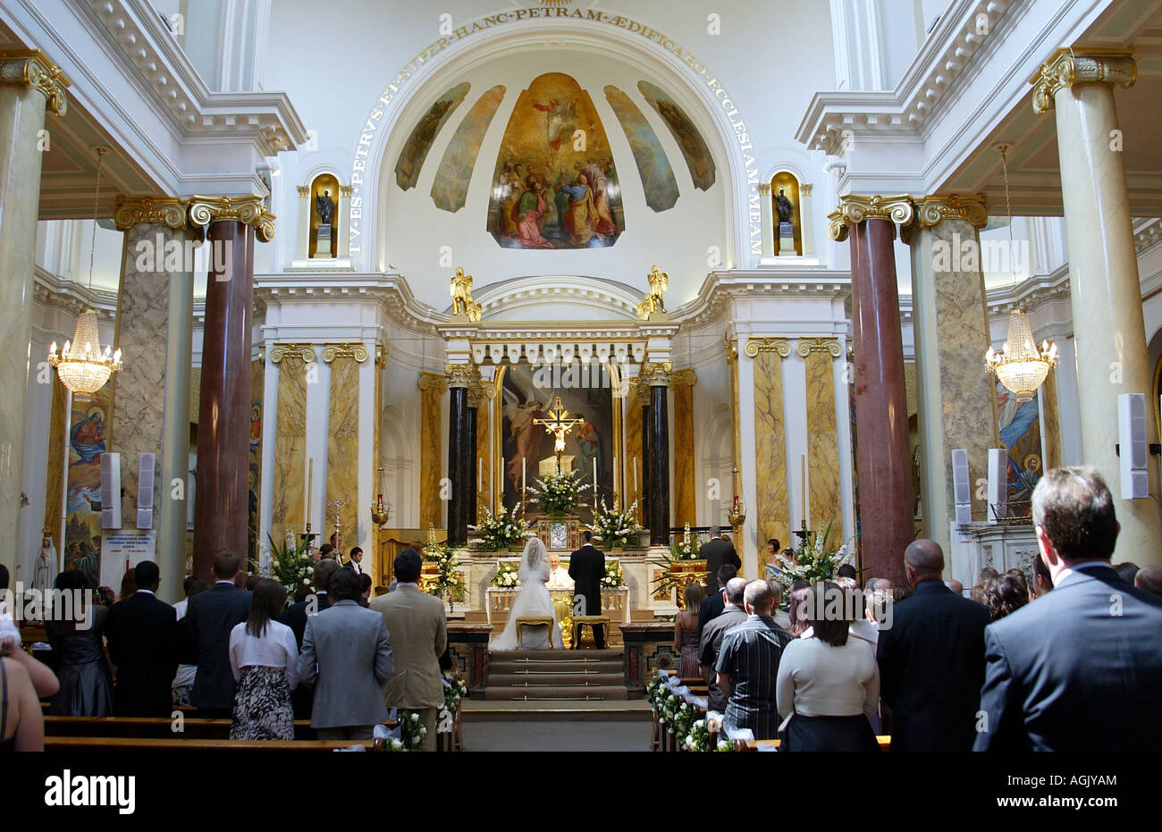 Interior of a Catholic Church with a wedding taking place Stock Photo ...