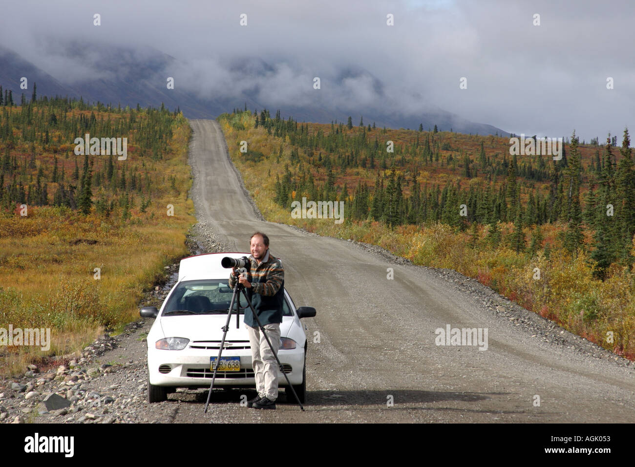 Person stands on gravel road hi-res stock photography and images - Alamy