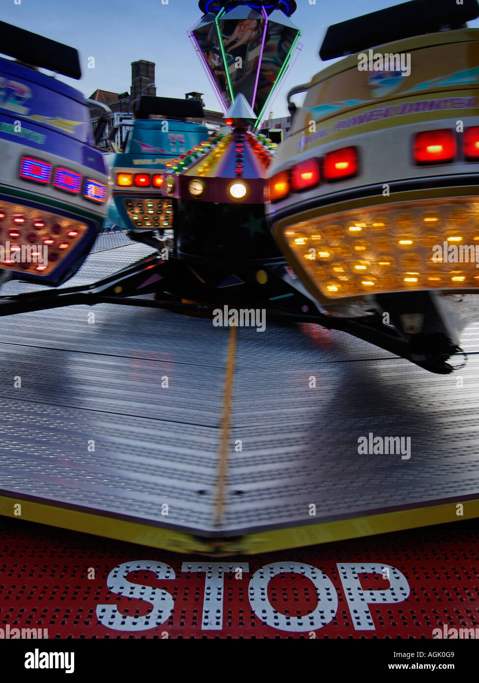 Stop sign at fast moving ride on the yearly fun fair fairground in ...