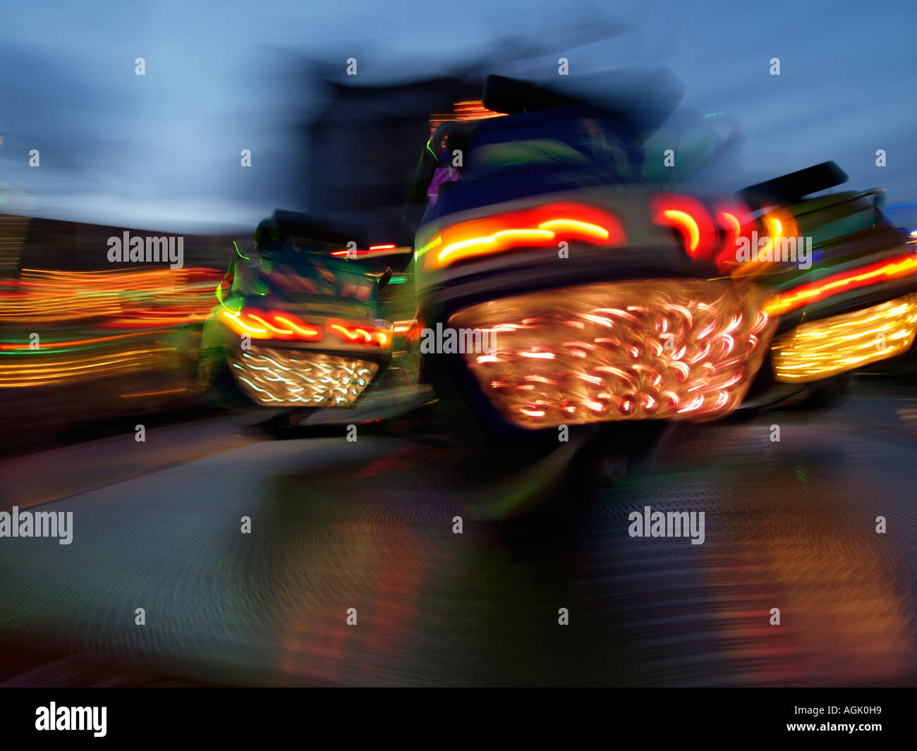 People in fast spinning ride on the yearly fun fair fairground in ...