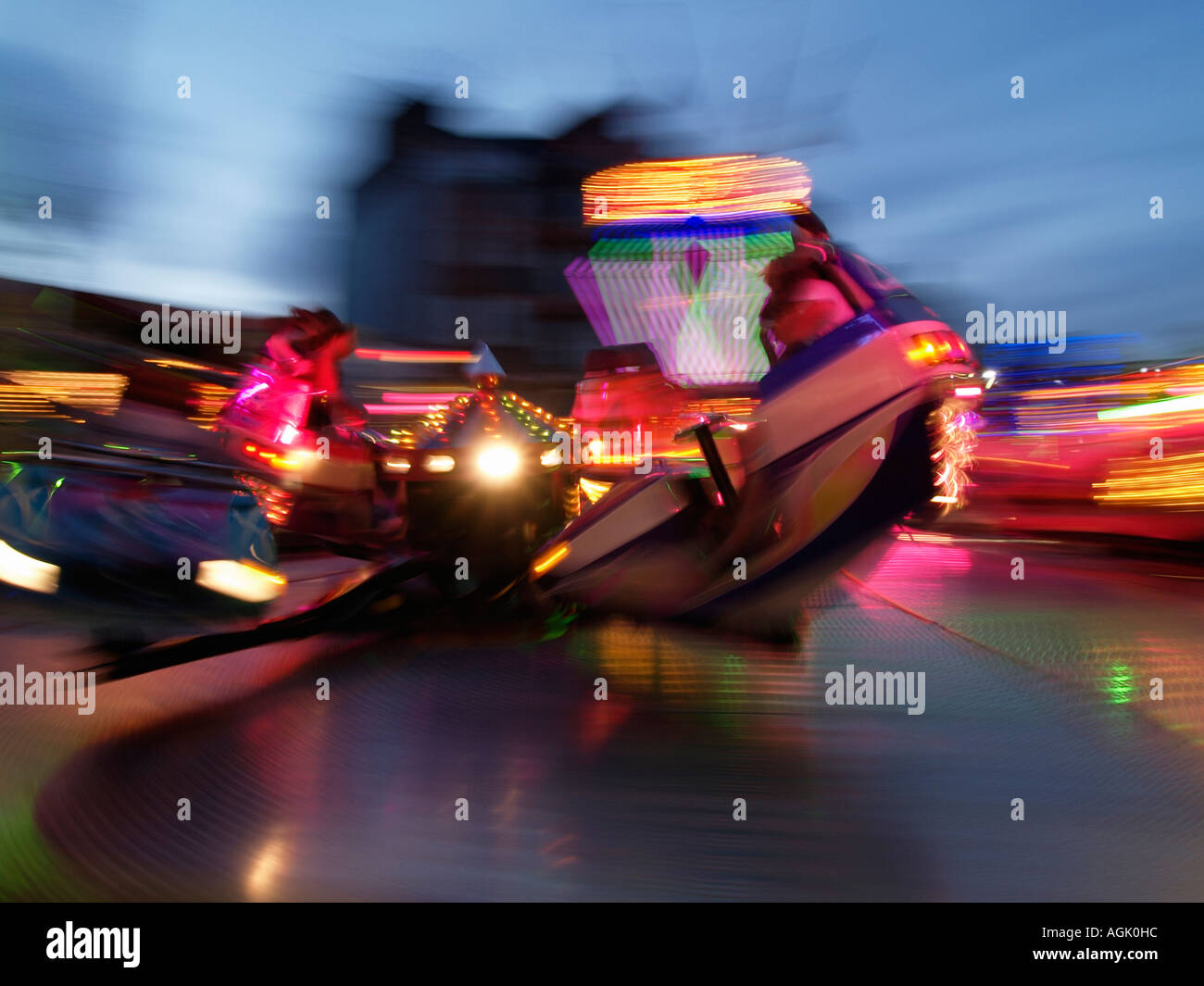 People in fast spinning ride on the yearly fun fair fairground in ...
