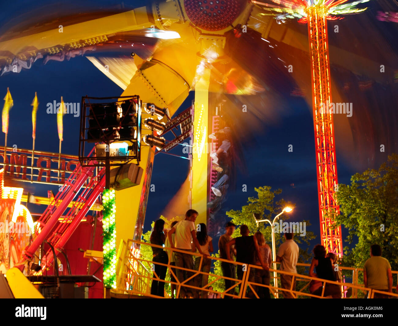 People waiting for their turn on the yearly fun fair fairground in ...