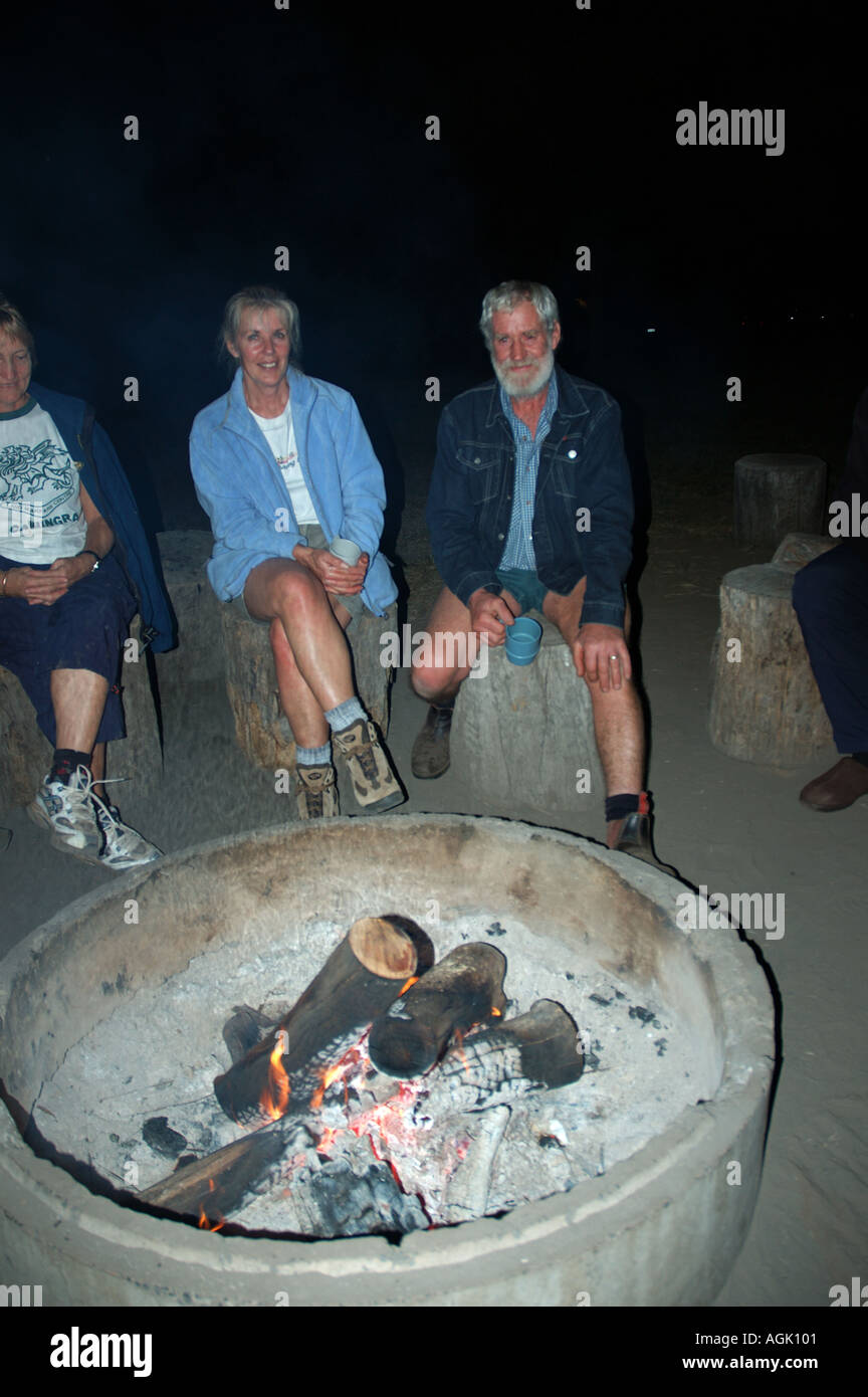 Sitting round the campfire hi-res stock photography and images - Alamy