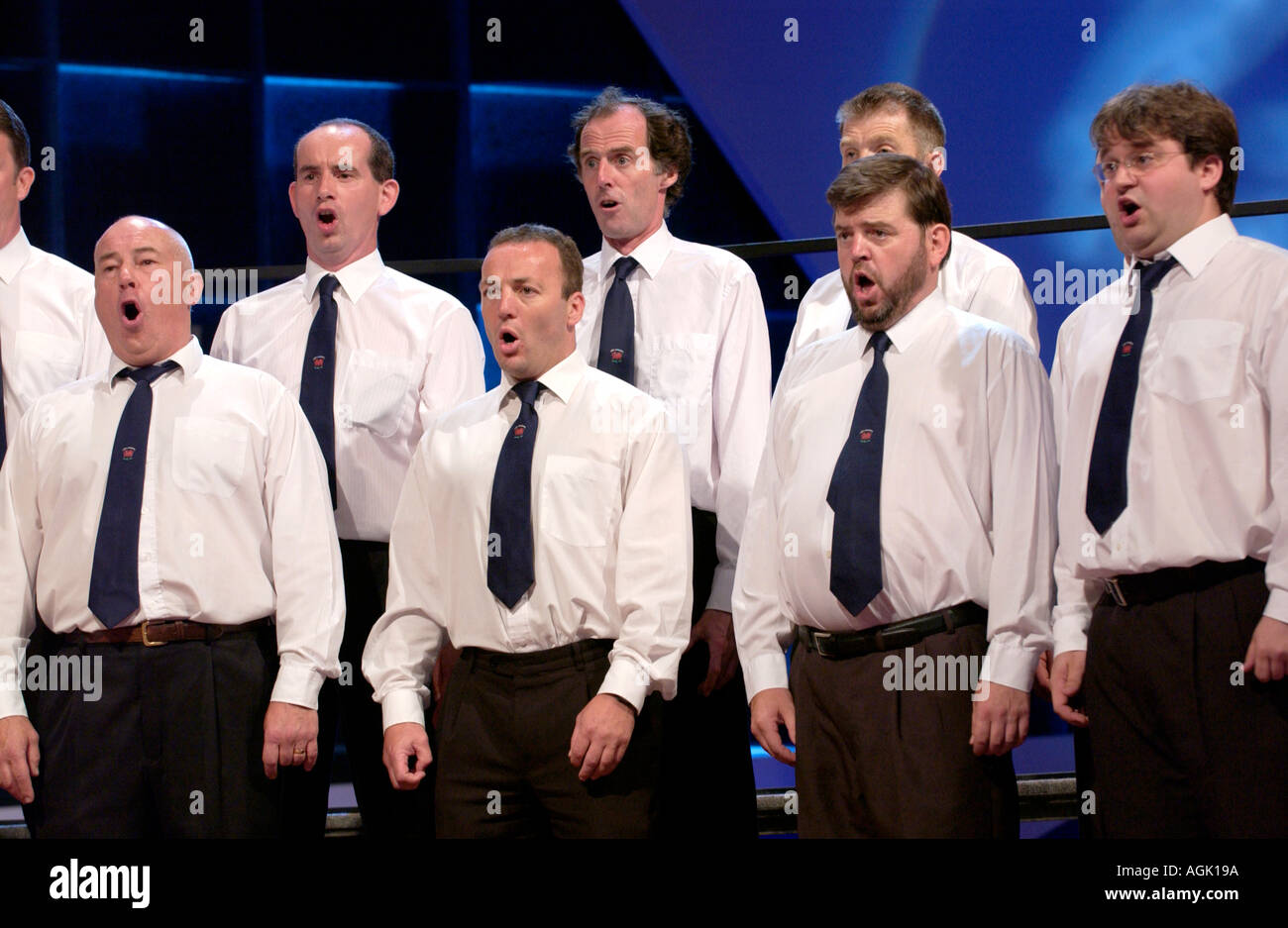 Male voice choir on stage singing in competition at the National ...