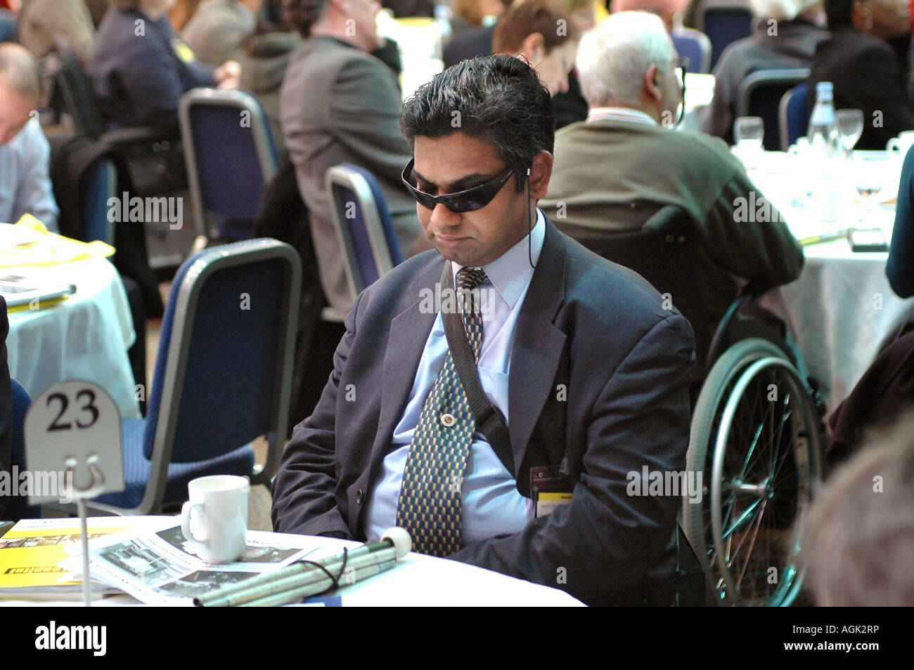 Blind man wearing dark glasses attending the Disability Capital ...