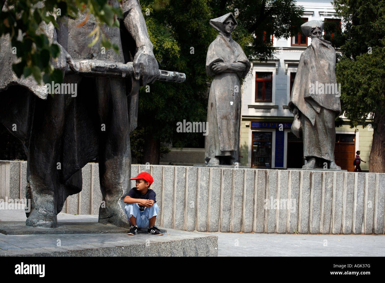 Boy sits on the monument of the Slovak Uprising. Namesti SNP ...