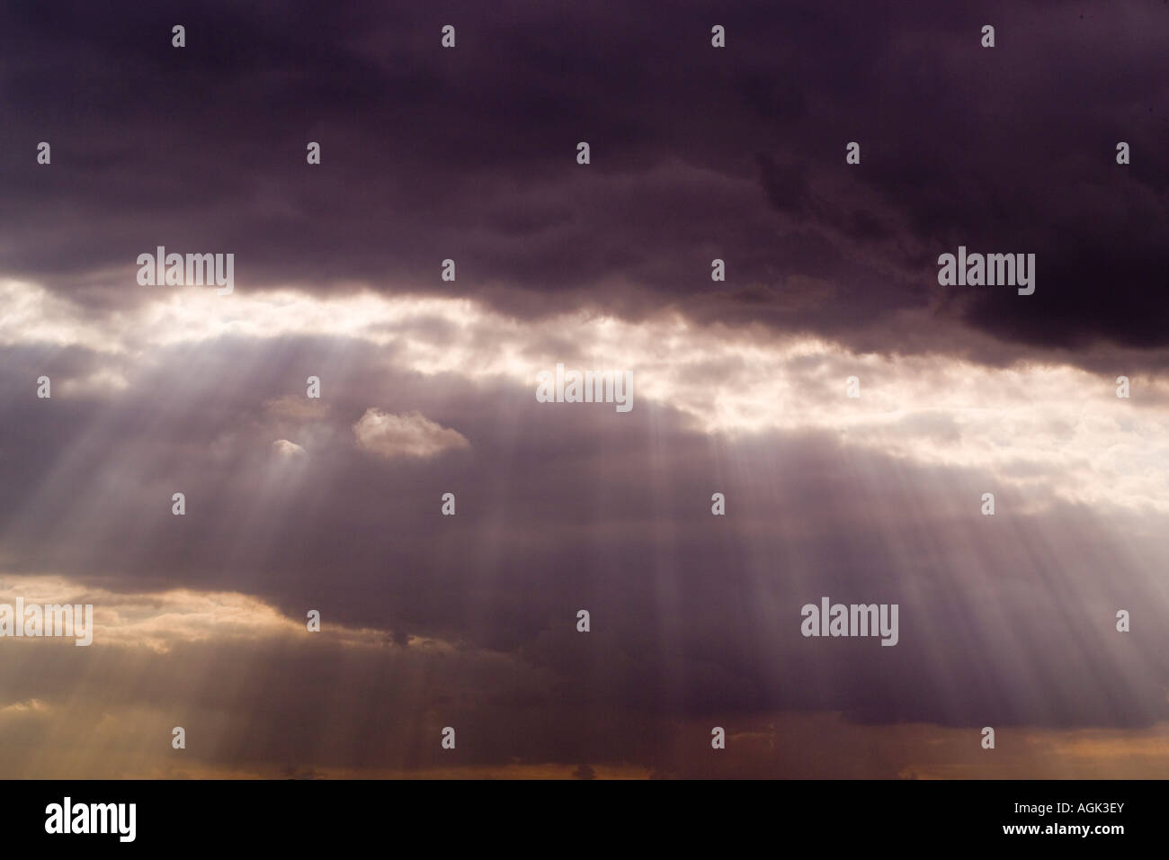 sunlight bursting through storm clouds Stock Photo - Alamy