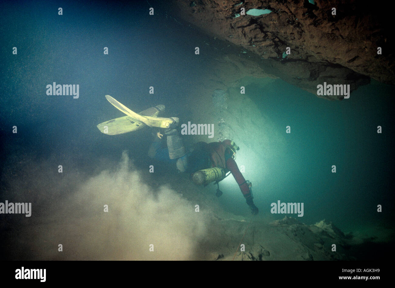 Cave diver exploring Wookey Hole Cave system, Somerset, UK Stock Photo ...