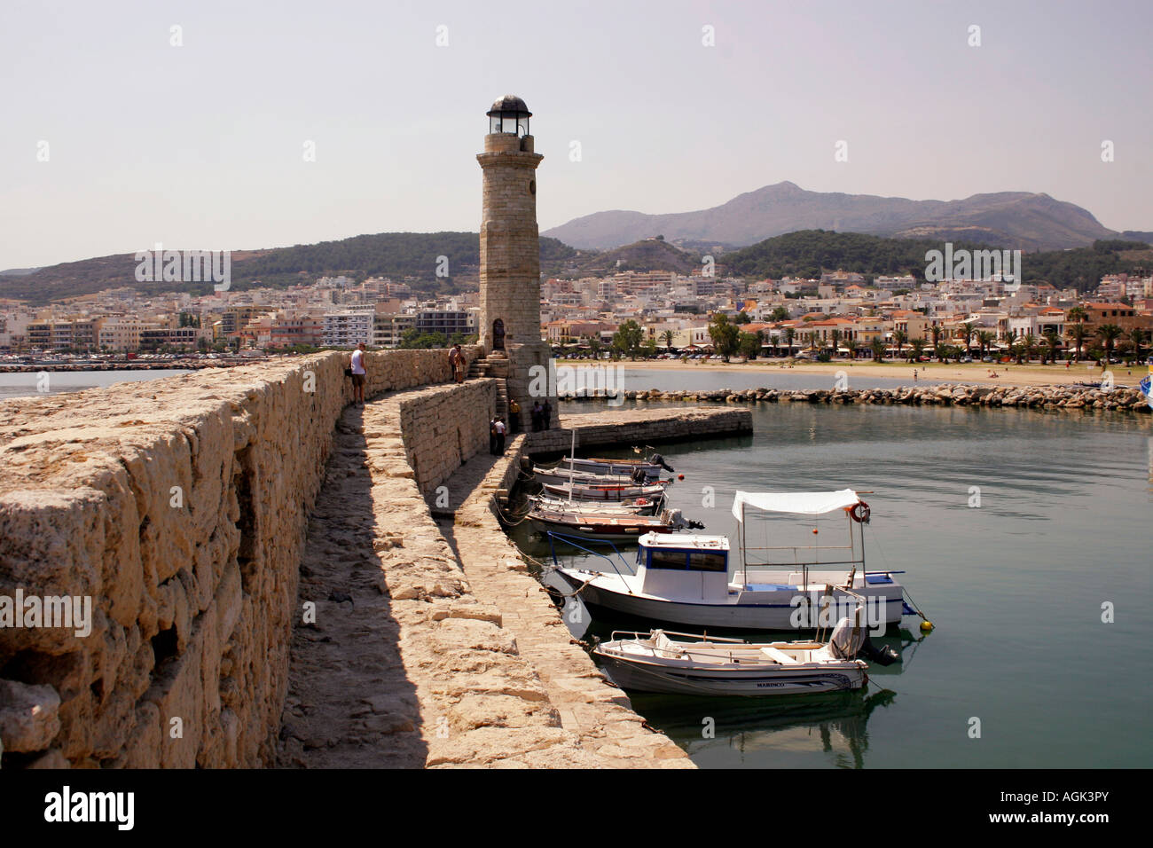 THE VENETIAN LIGHTHOUSE AND HARBOUR AT RETHYMNON. CRETE. MEDITERRANEAN ...