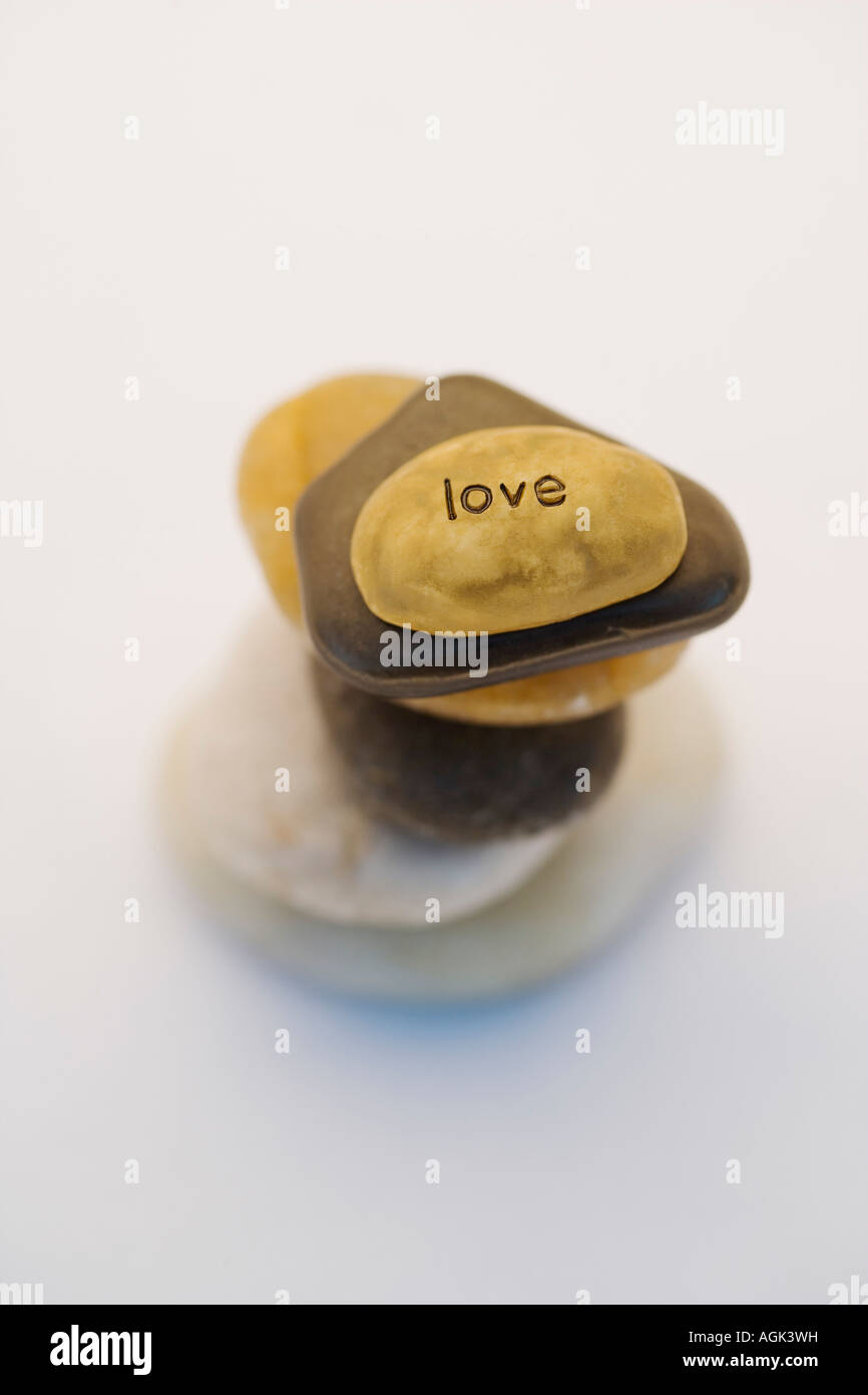 Stack of stones representing love Stock Photo - Alamy