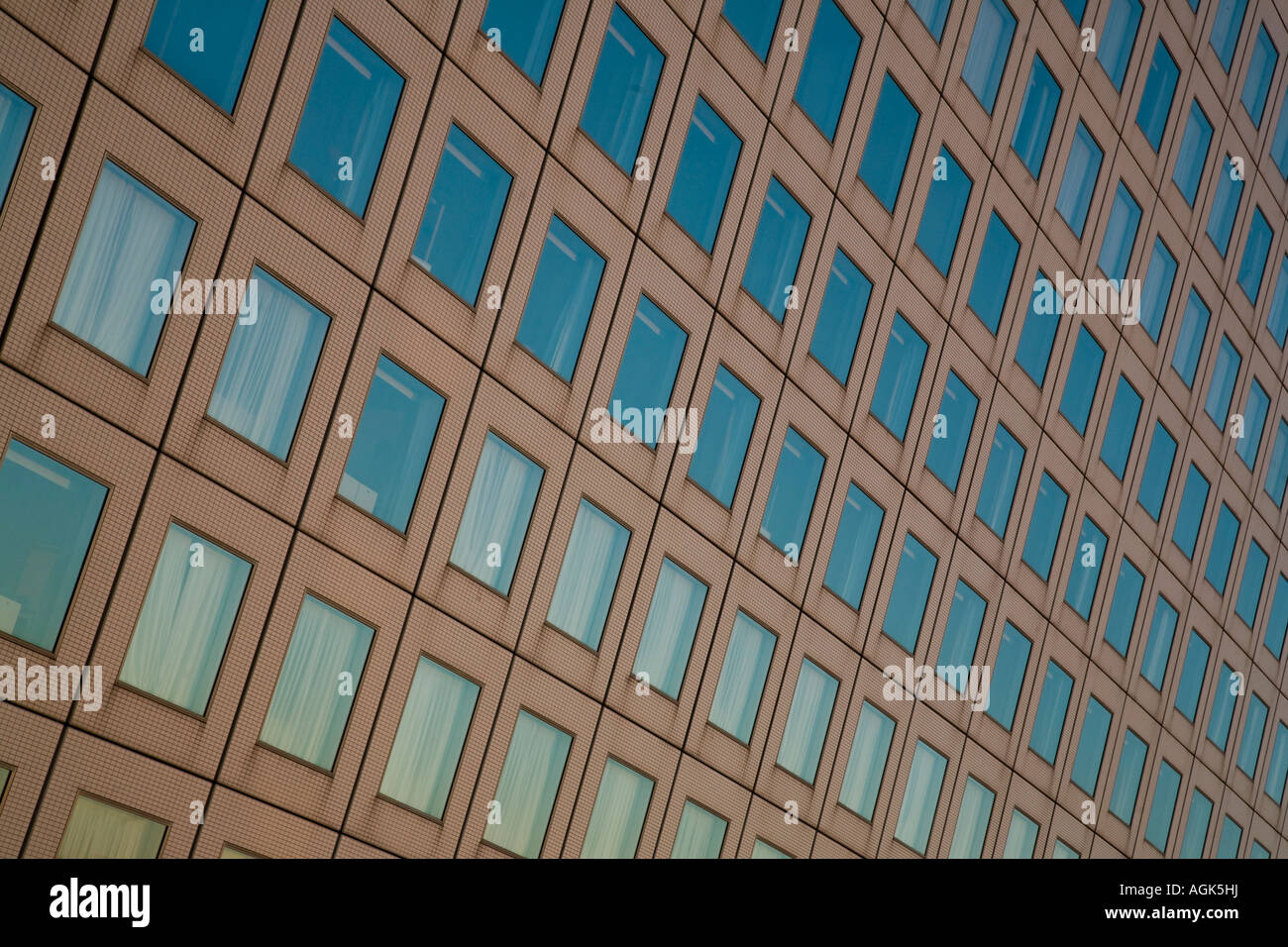 Graphic shot of building windows creating pattern tokyo japan fareast ...