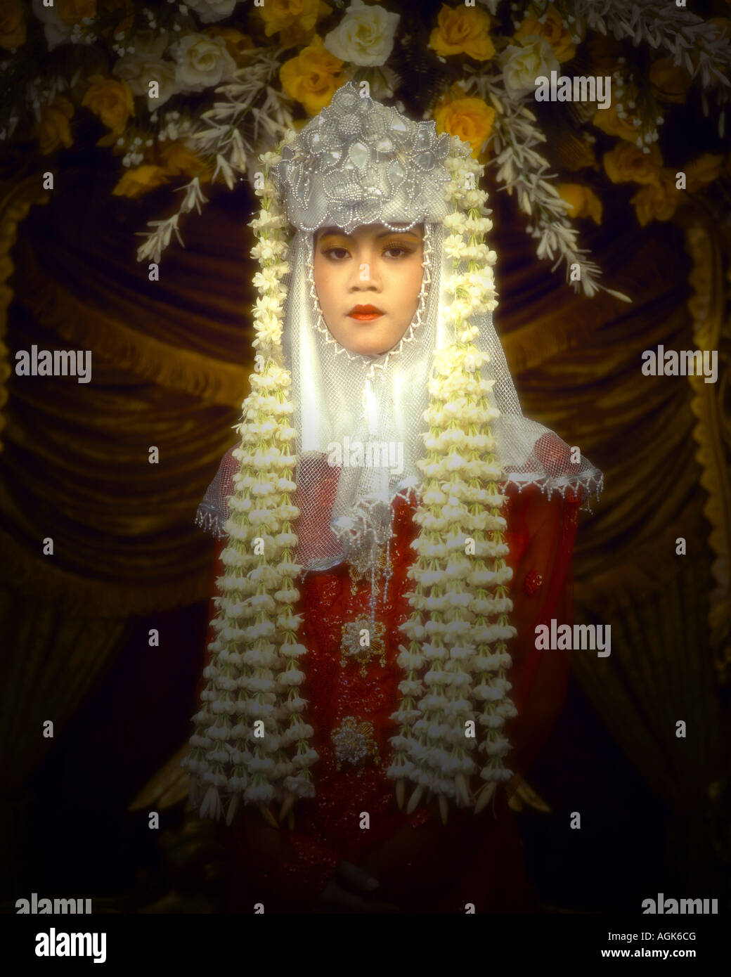 Indonesia, East Java, Blitar. Javanese bride in colorful traditional ...