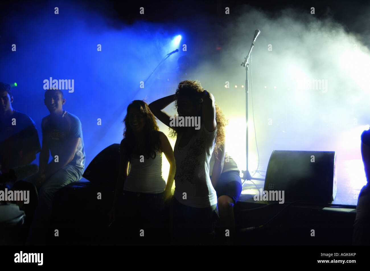 An excited crowd in front of the stage at a rock concert Stock Photo ...