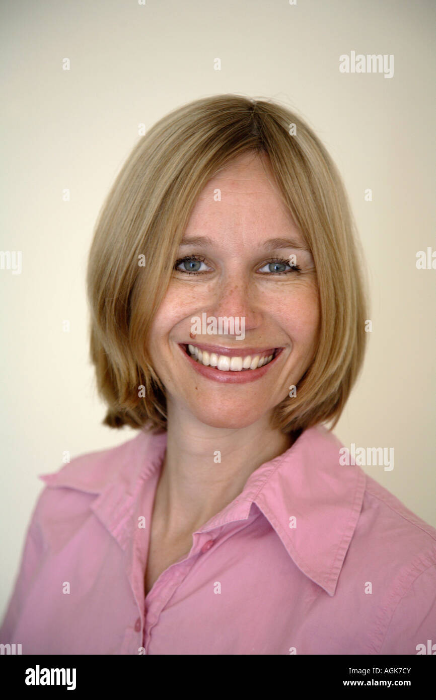 Portrait of a smiling woman Stock Photo - Alamy