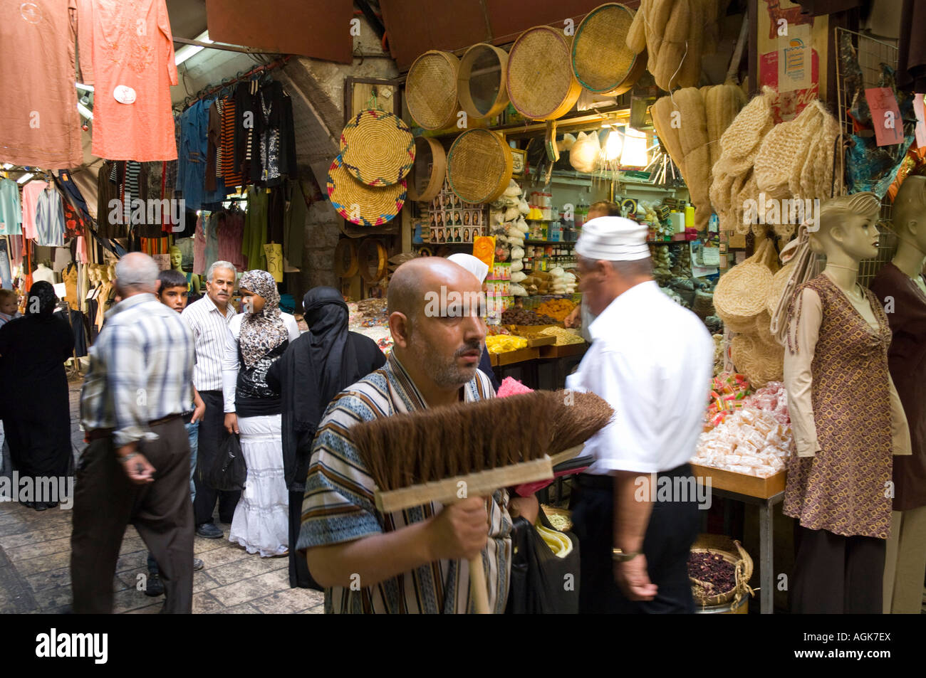 Israel Jerusalem Old City Market Muslem quarter man selling brooms in ...