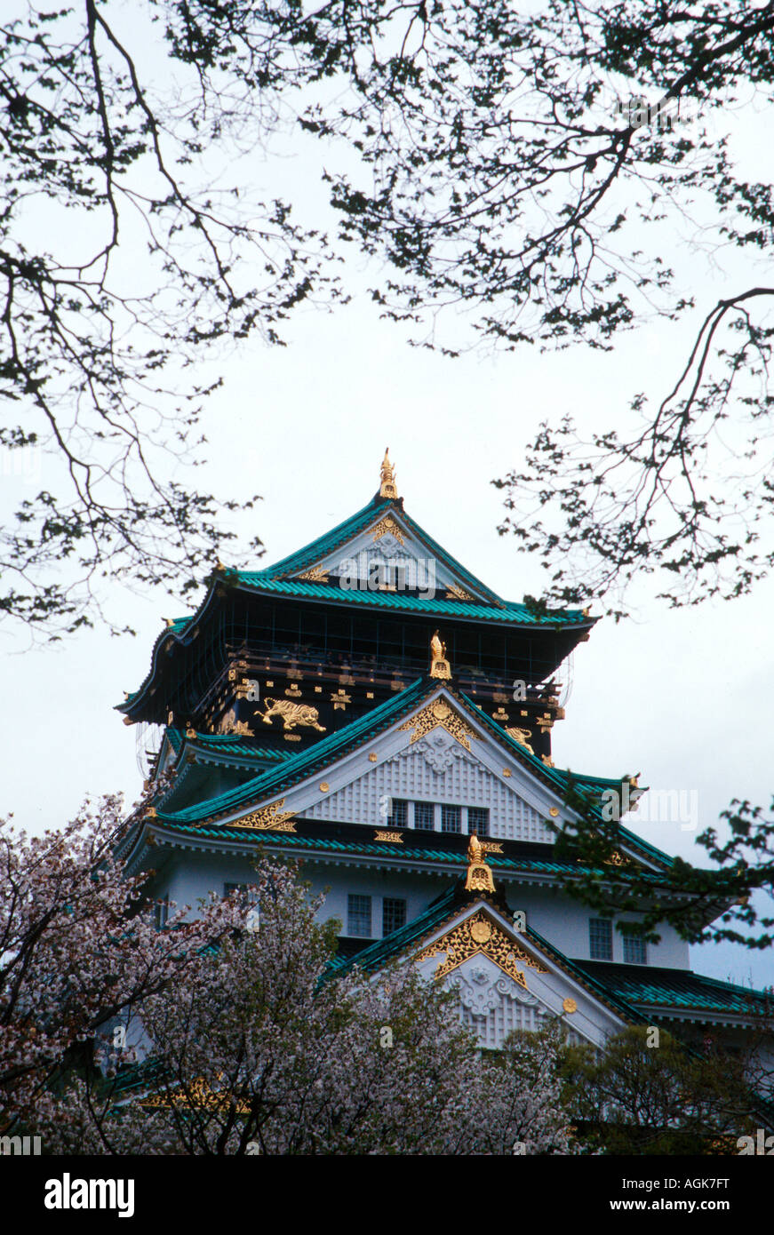 Asia, Japan, Osaka. Osaka Castle and cherry blossom trees Stock Photo ...