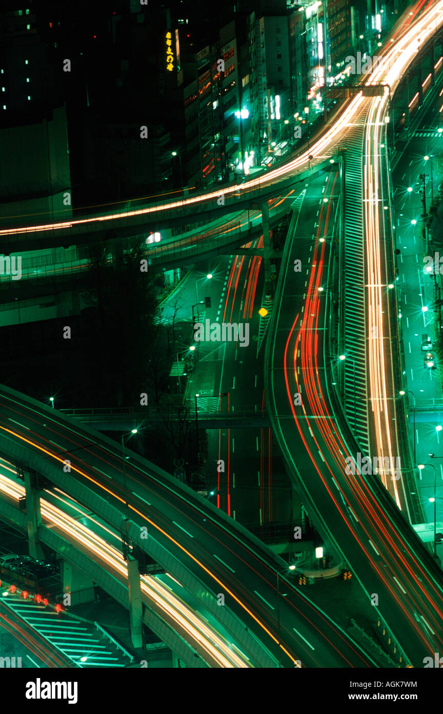 Asia, Japan, Tokyo. Nighttime aerial view of freeways and traffic ...