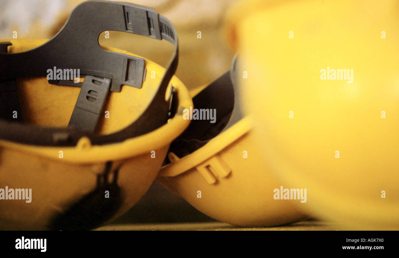 yellow hard hats Stock Photo - Alamy