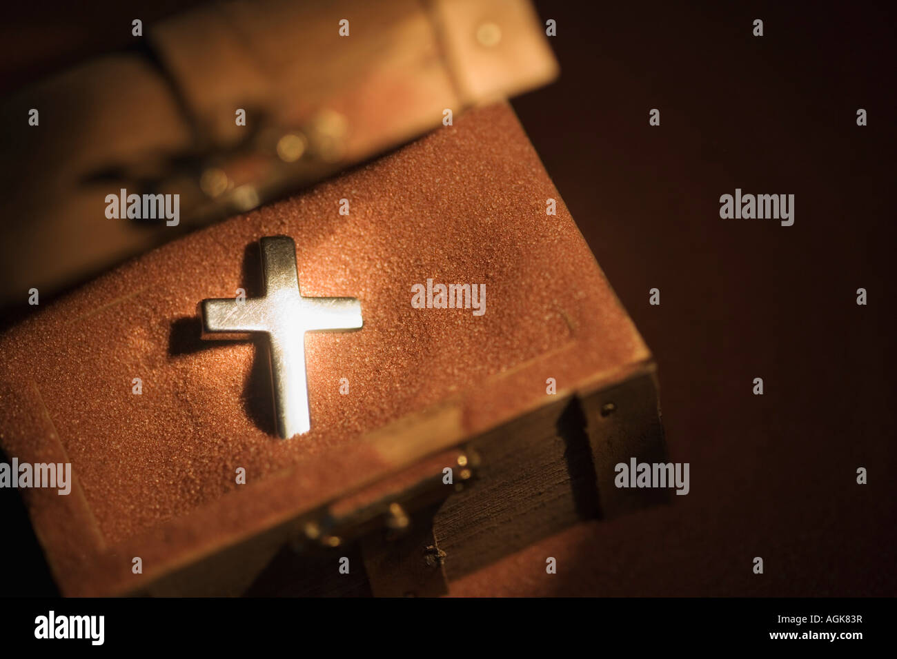 Cross in a wooden box Stock Photo - Alamy