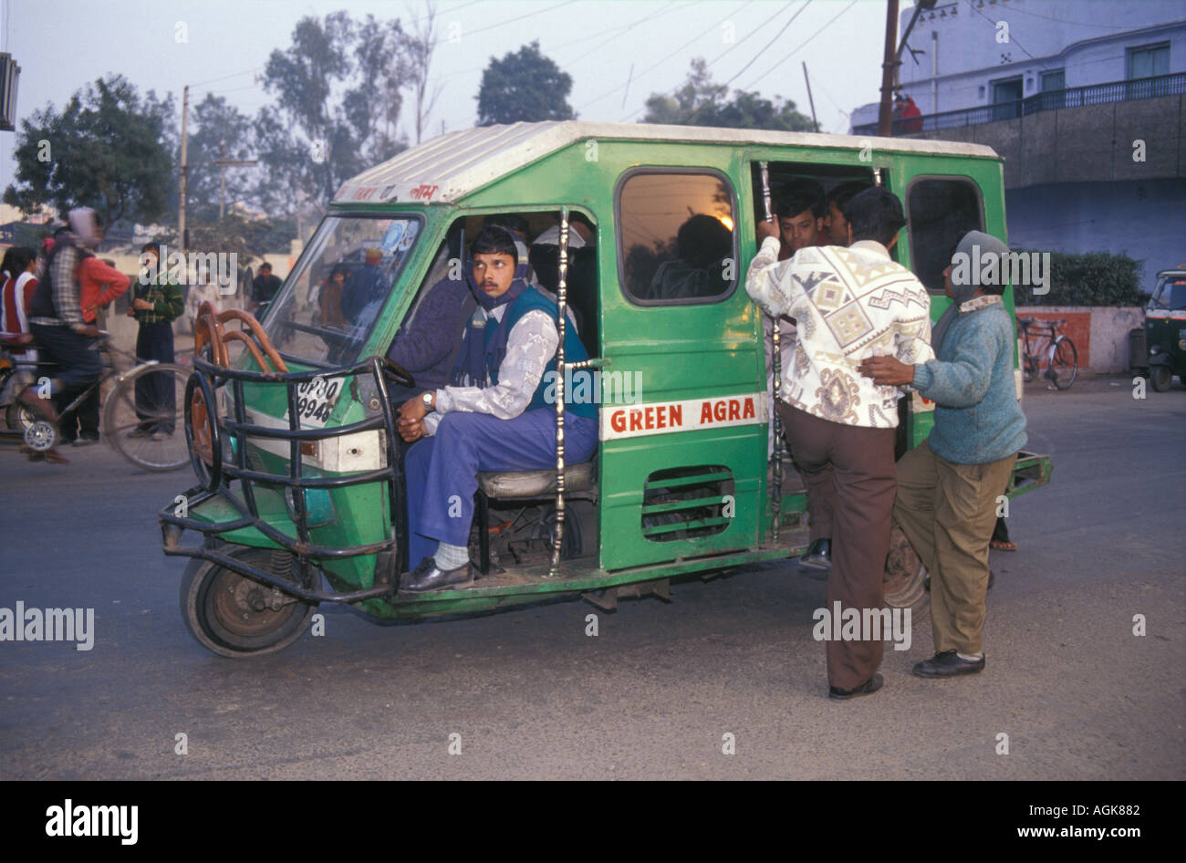 Small Green Agra Transport bus with passengers, Agra, India Stock Photo ...