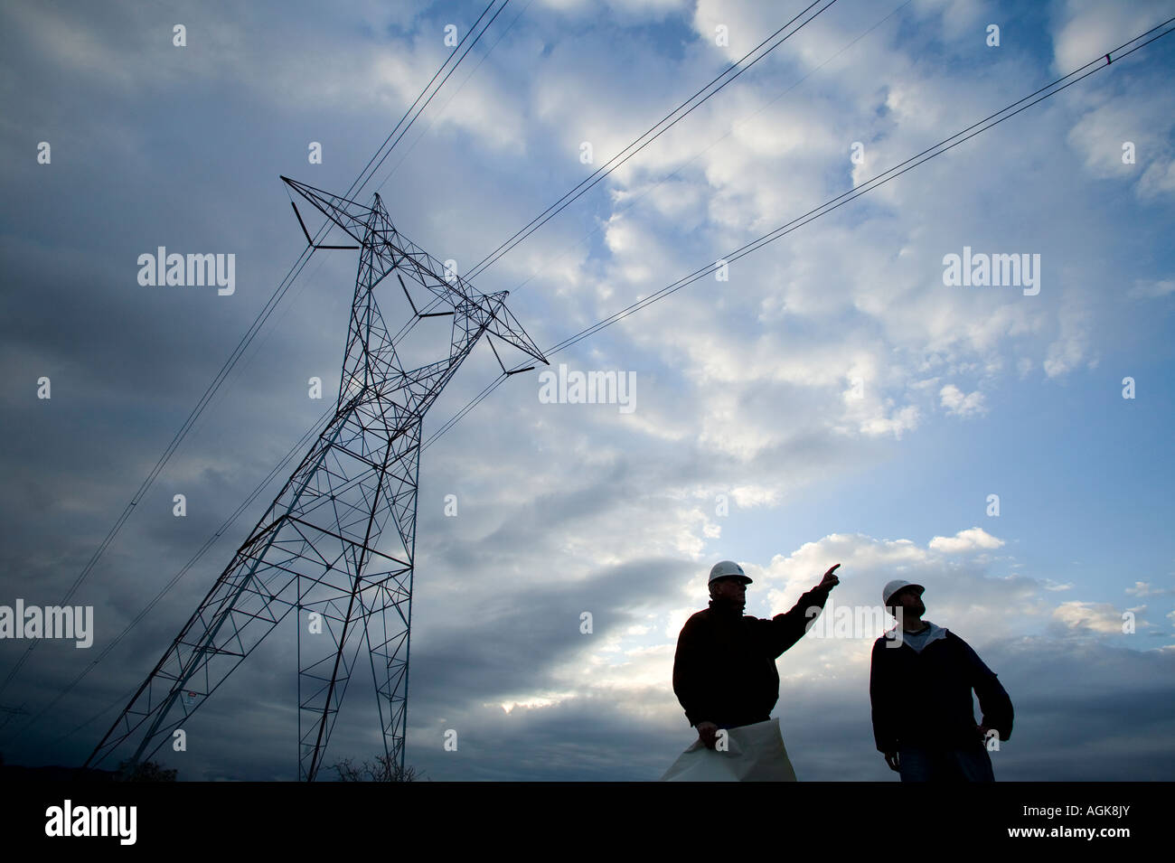 Electrical Power Lines Workers High Resolution Stock Photography and ...