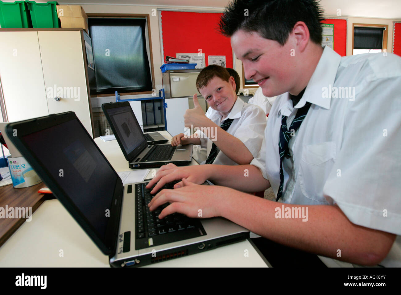 14 to 18, High school boys using laptop computers south of England ...