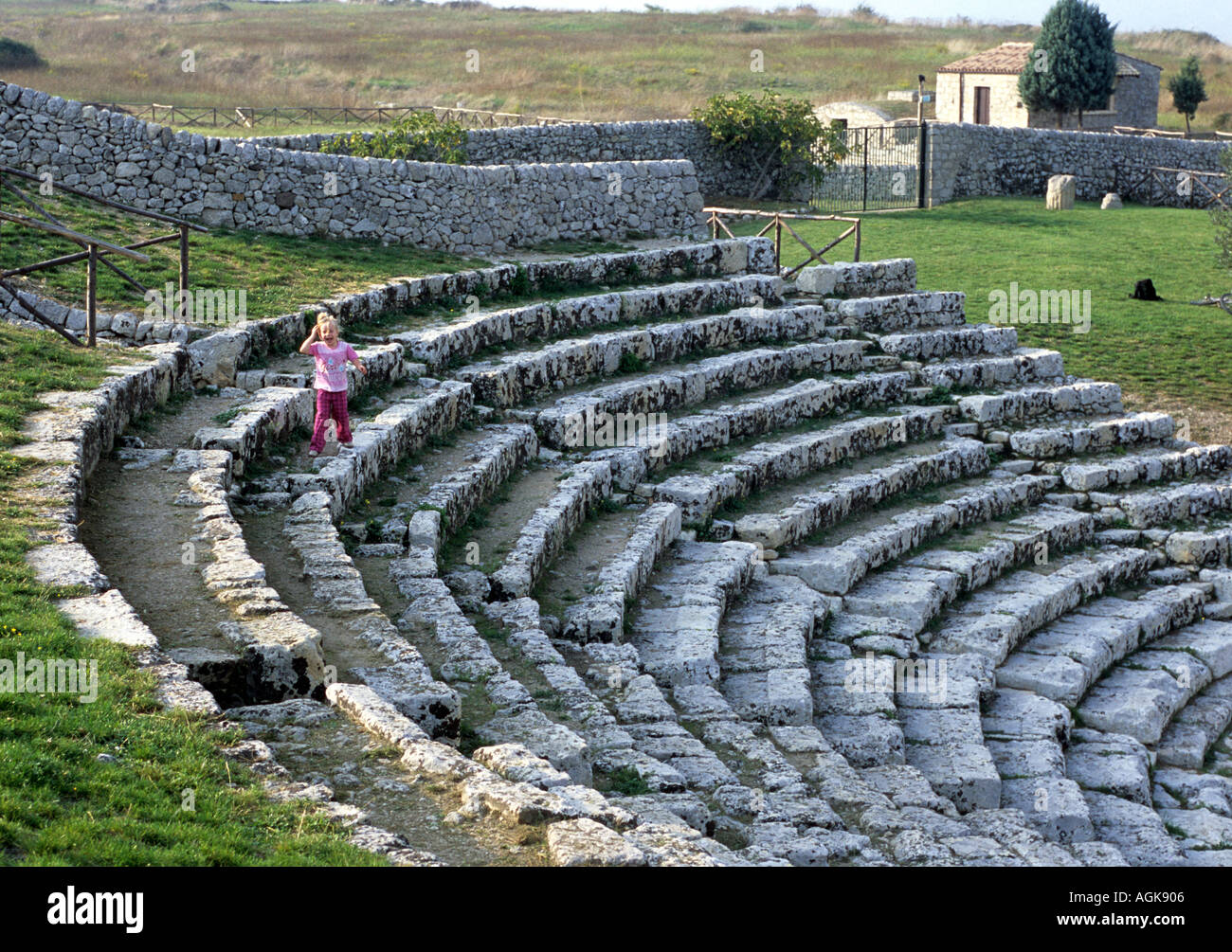 Child running around the Roman Ampitheatre Palazzolo Acreide Sicily ...