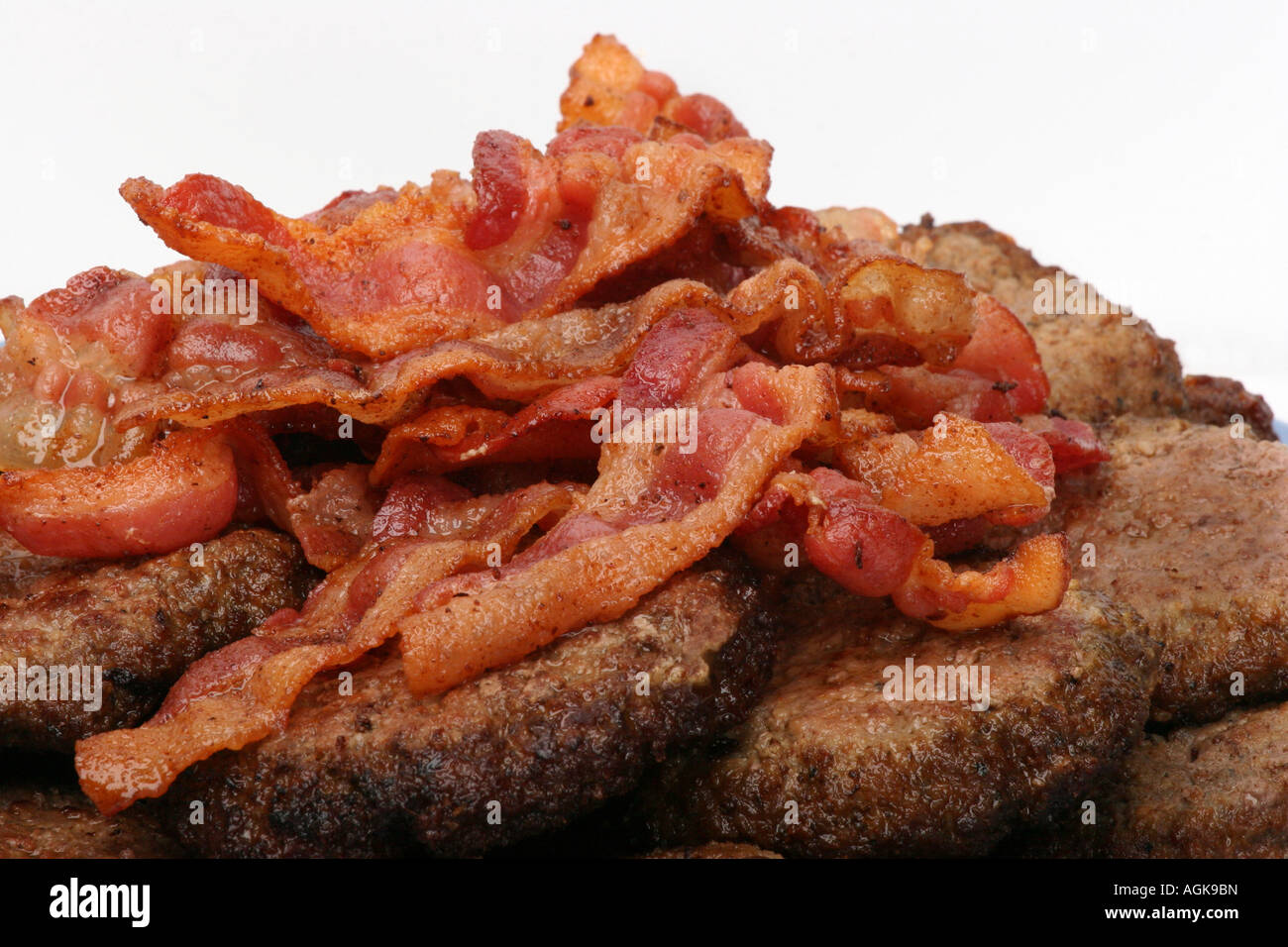 Fried beef patties with roasted bacon fresh fast food on the table from ...