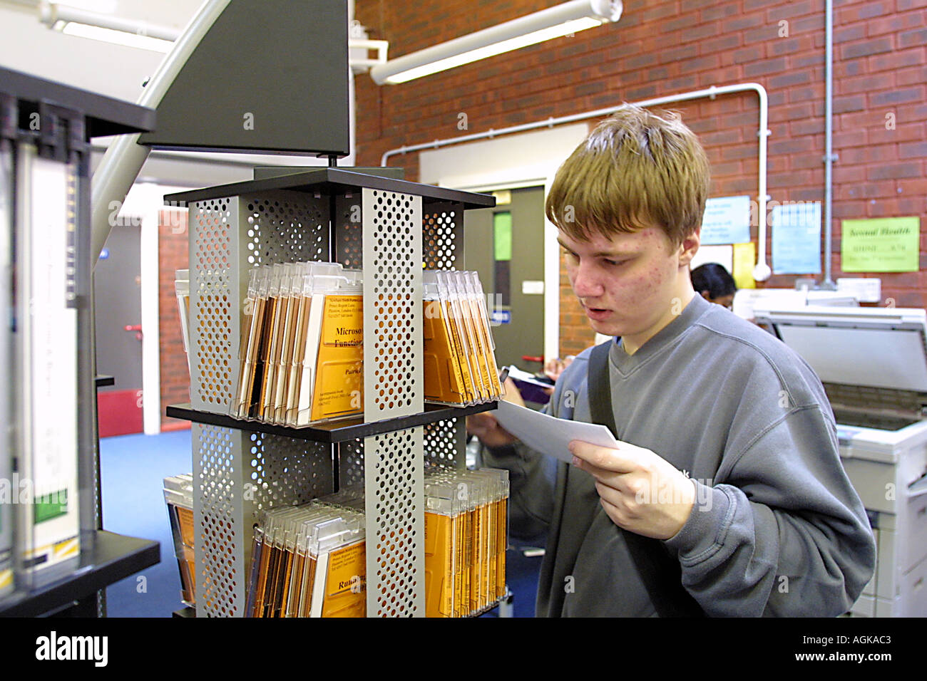 Male Sixth form college student in college library, east London GB UK ...