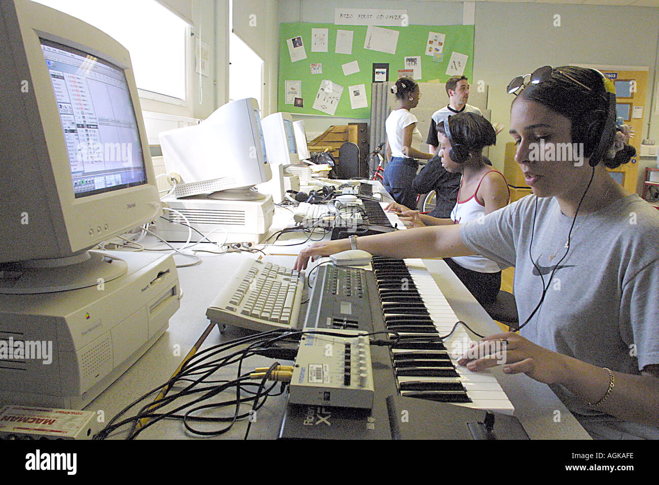 Music student at digital mixing desk in studio sixth form college east ...