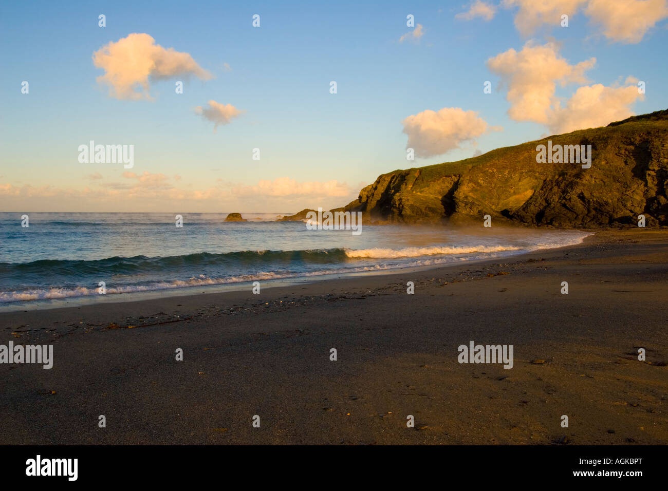 Poldhu cove at sunrise Stock Photo - Alamy