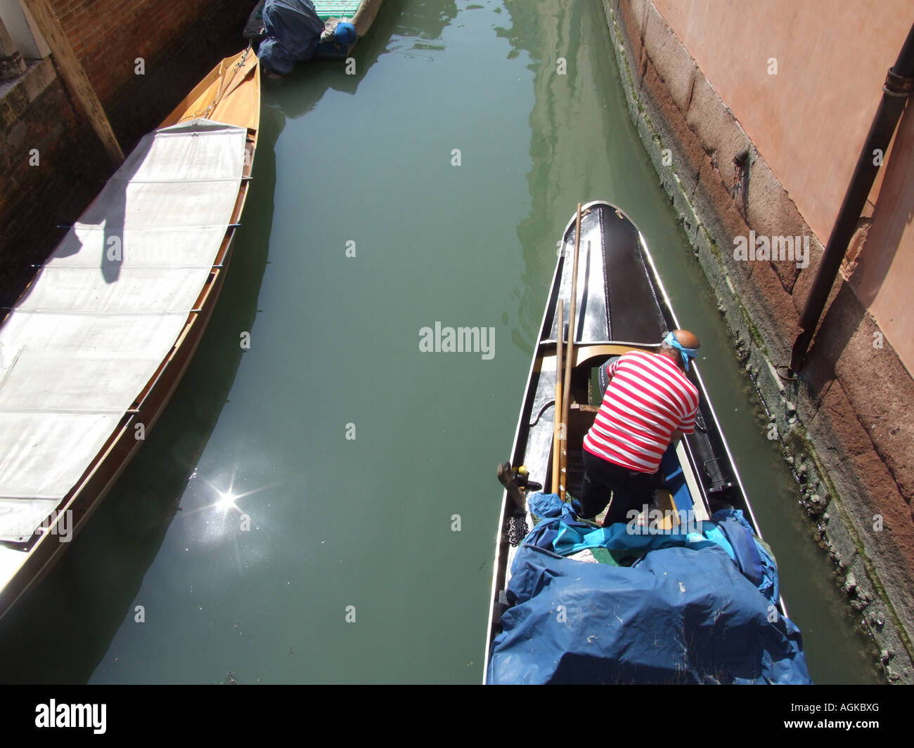 gondolier in venice Stock Photo - Alamy