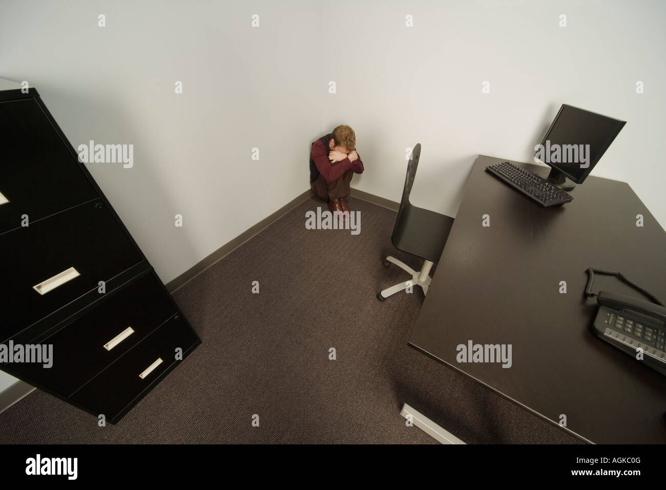 Businessman crying in his office Stock Photo - Alamy