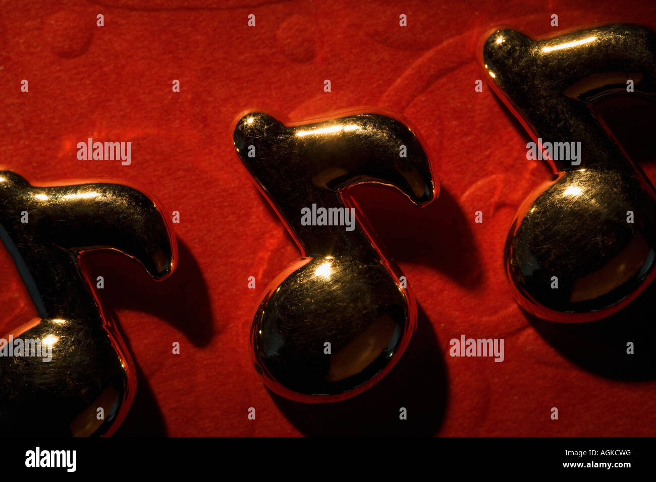 Musical notes on the red background Stock Photo - Alamy