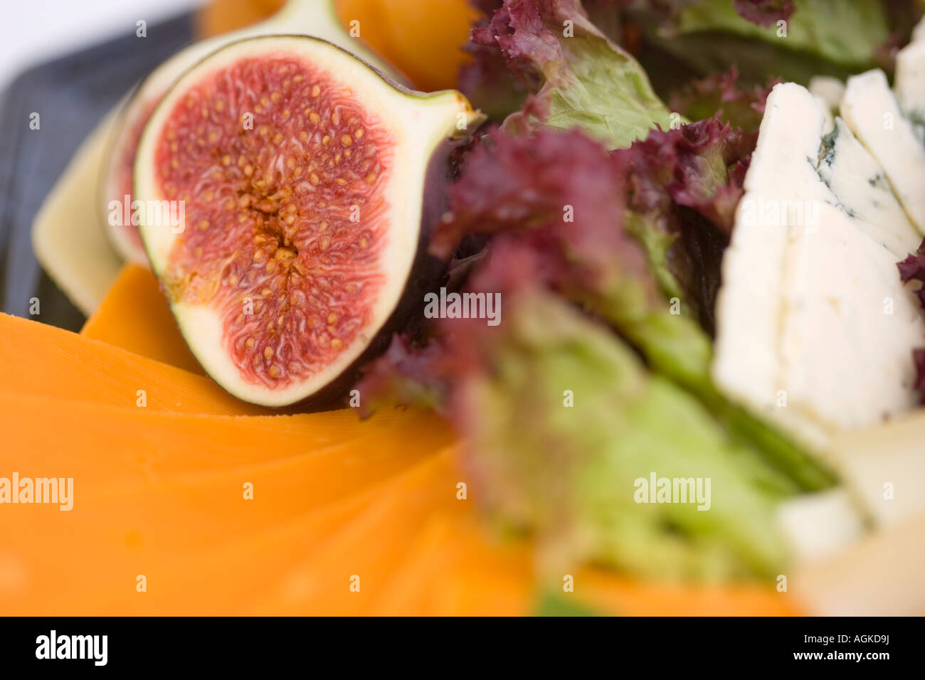 Sliced fig with cheese selection Stock Photo - Alamy