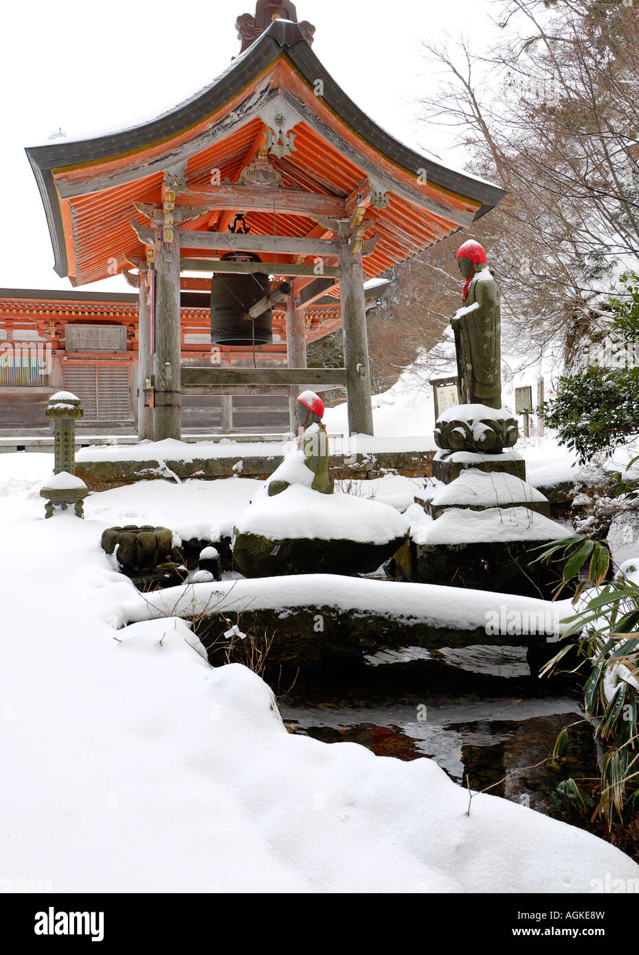 Temple bell in snow Stock Photo - Alamy