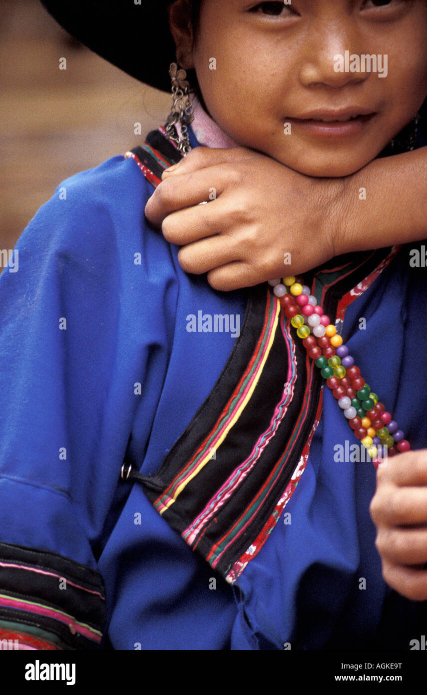 Beautiful teen age girl from the LOLO tribe smiles to the camera Stock ...
