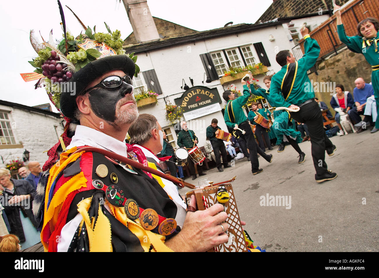 Wayzgoose morris man plays accordion for the dancers morris dancing at ...