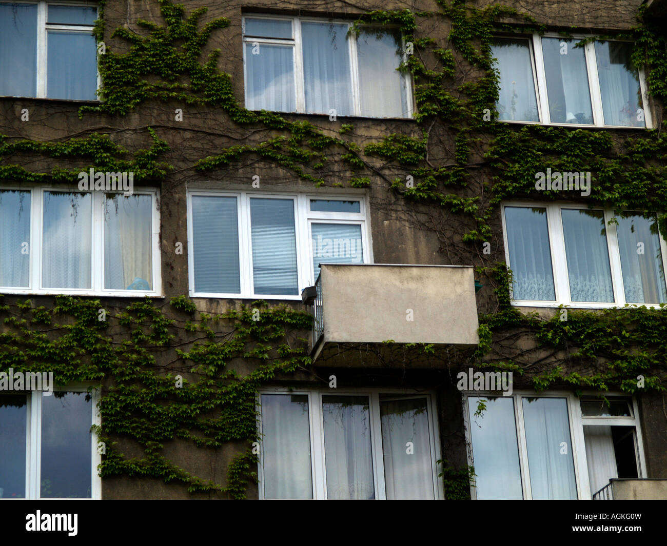 Windows on the side of an old-style communist housing unit in Warsaw ...