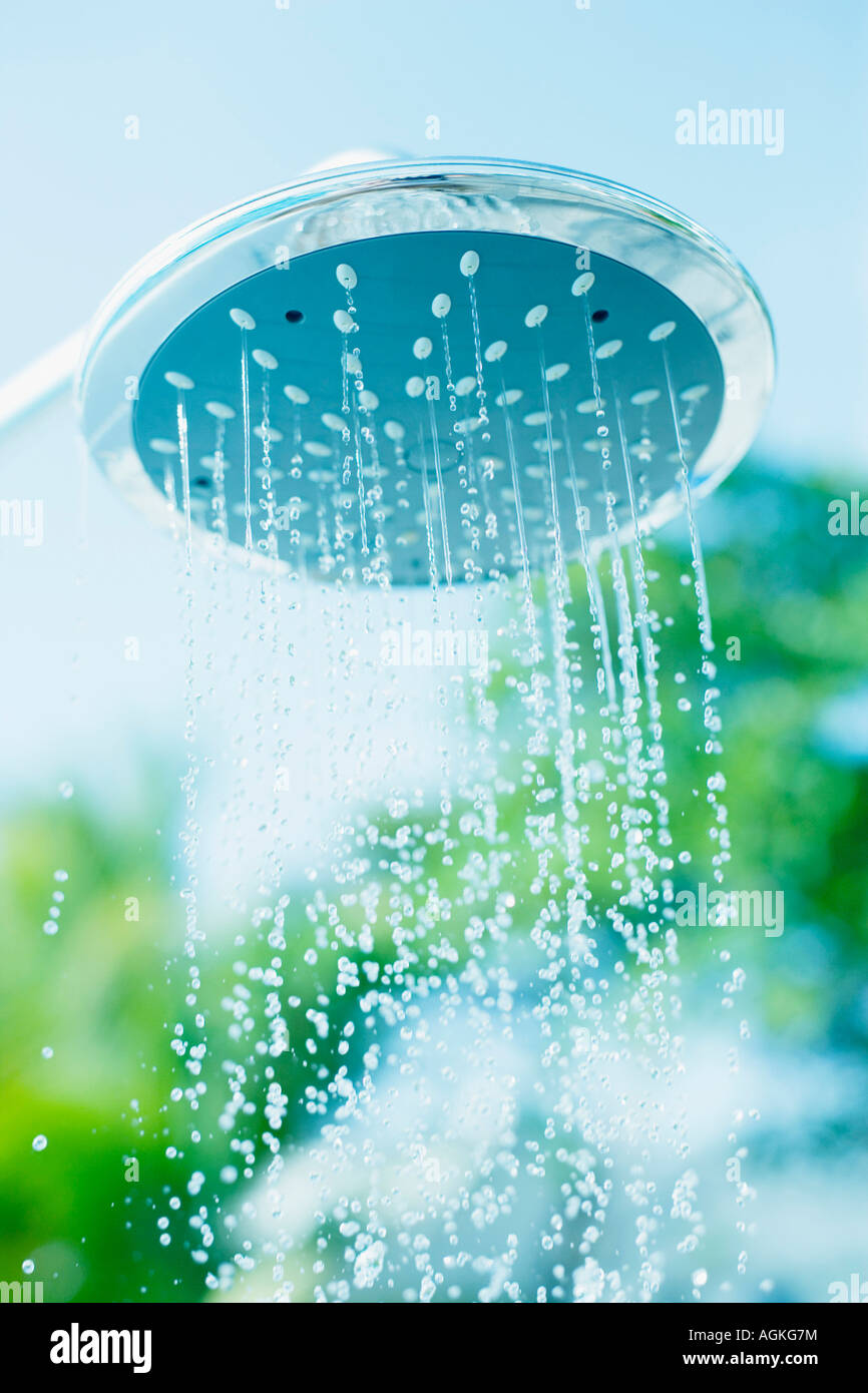 Water flowing out of a shower head Stock Photo - Alamy