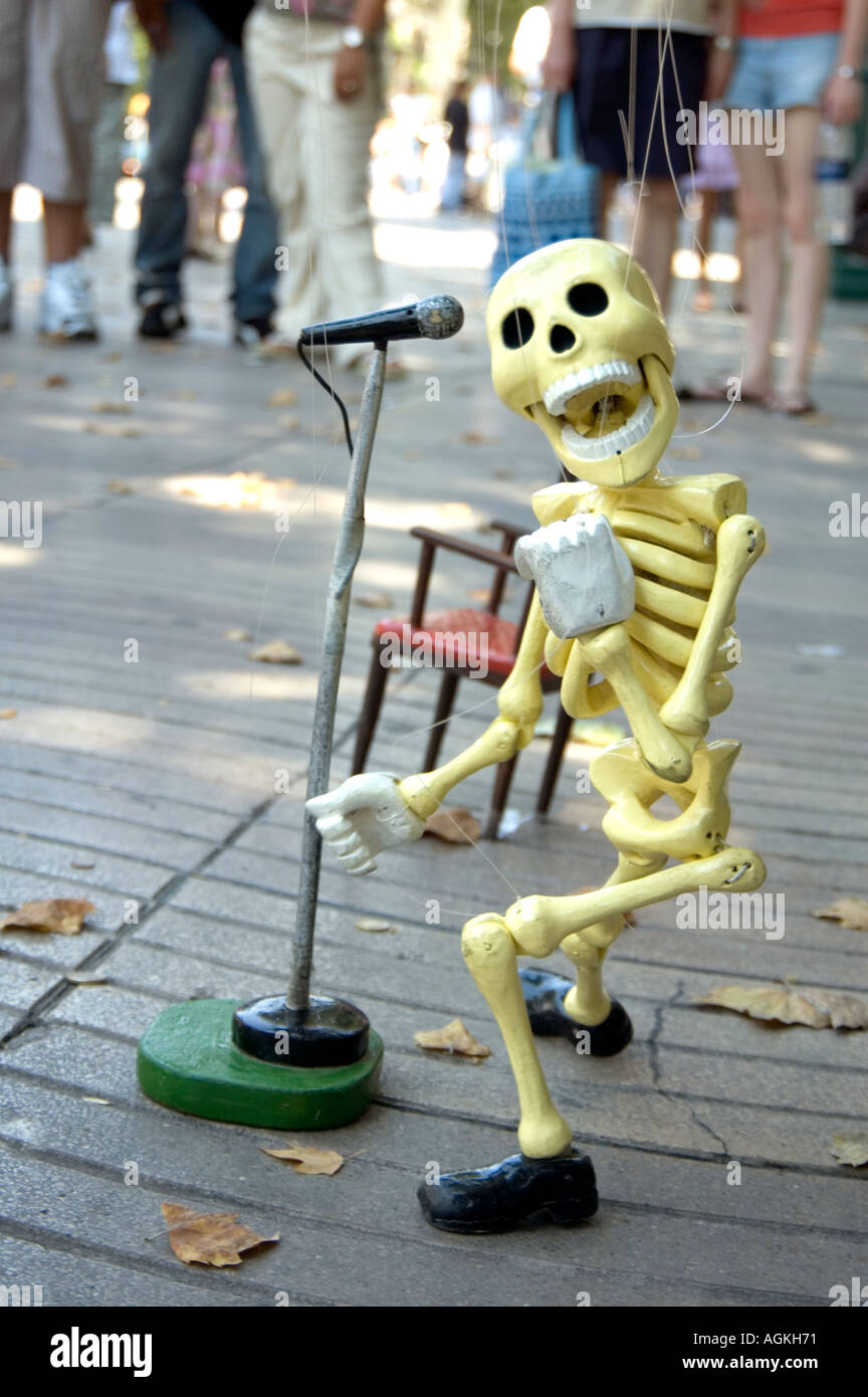Dancing singing rock n roll skeleton performed by street artist ...