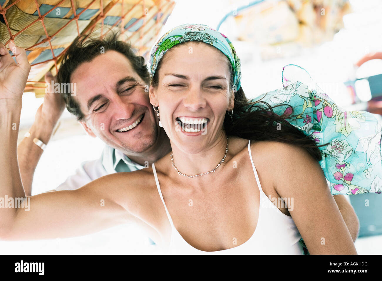 Mid adult couple smiling Stock Photo - Alamy